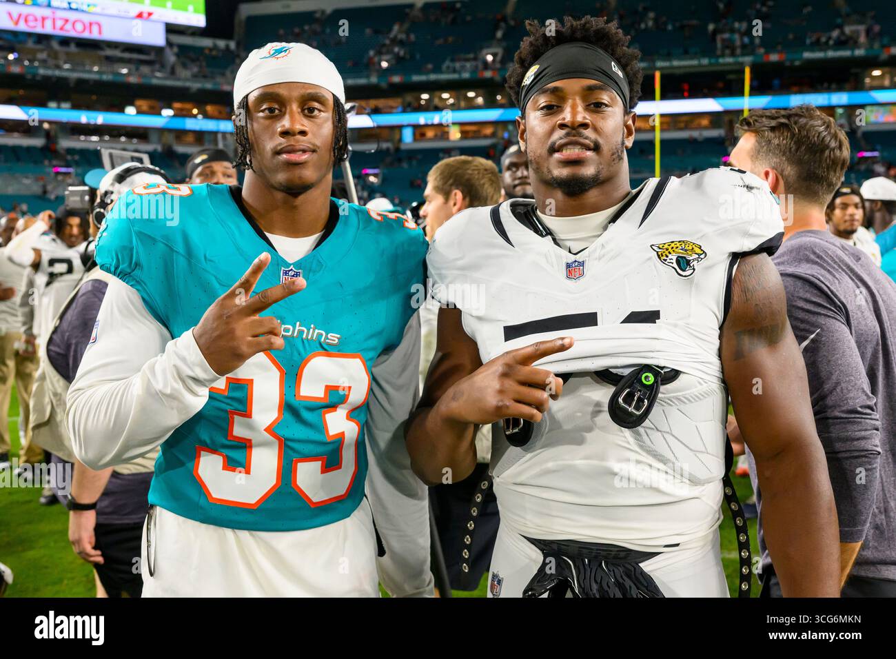 Miami Dolphins cornerback Jason Marshall Jr. (33) and Jacksonville ...