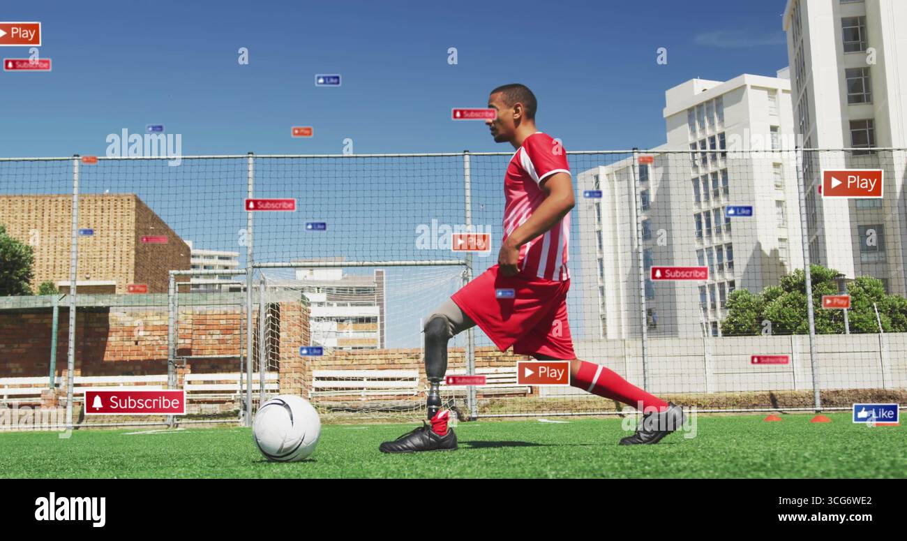 Blade-leg soccer player lining up ball for kick on artificial turf ...