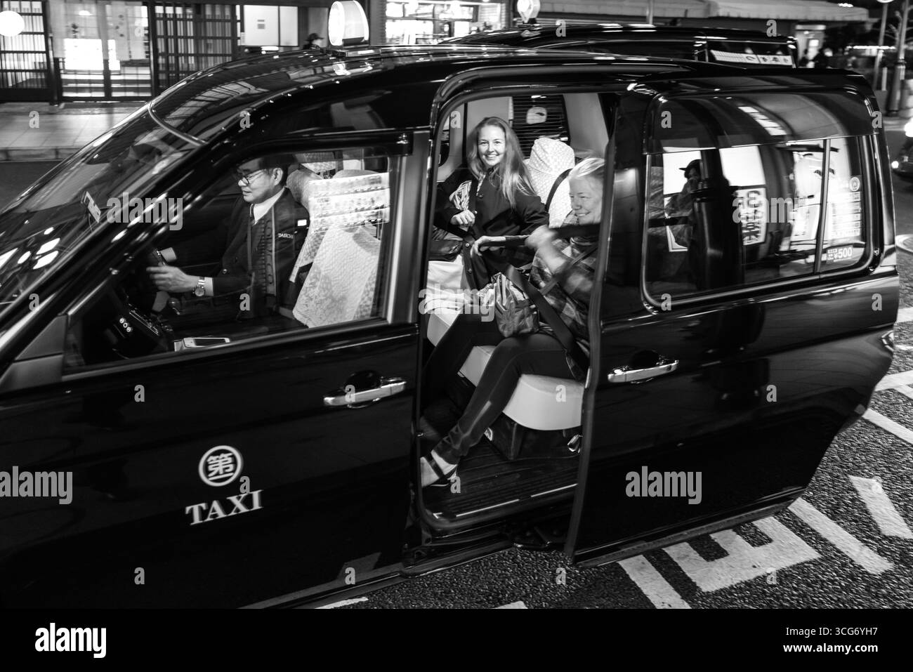 Driver in car night Black and White Stock Photos & Images - Alamy