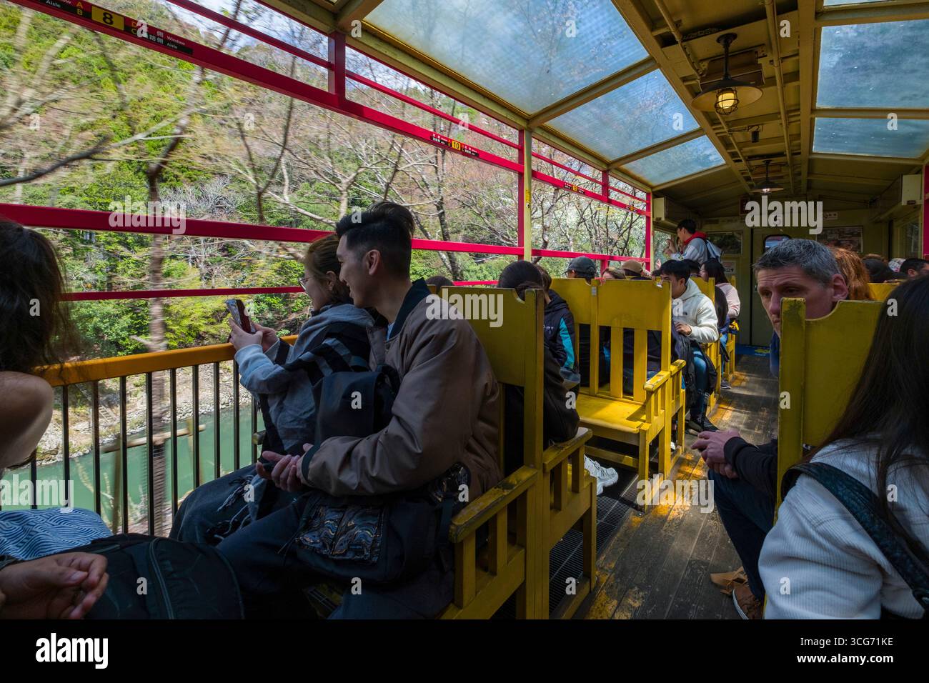 Tourist enjoying the scenic views of the Katsura River valley from the ...