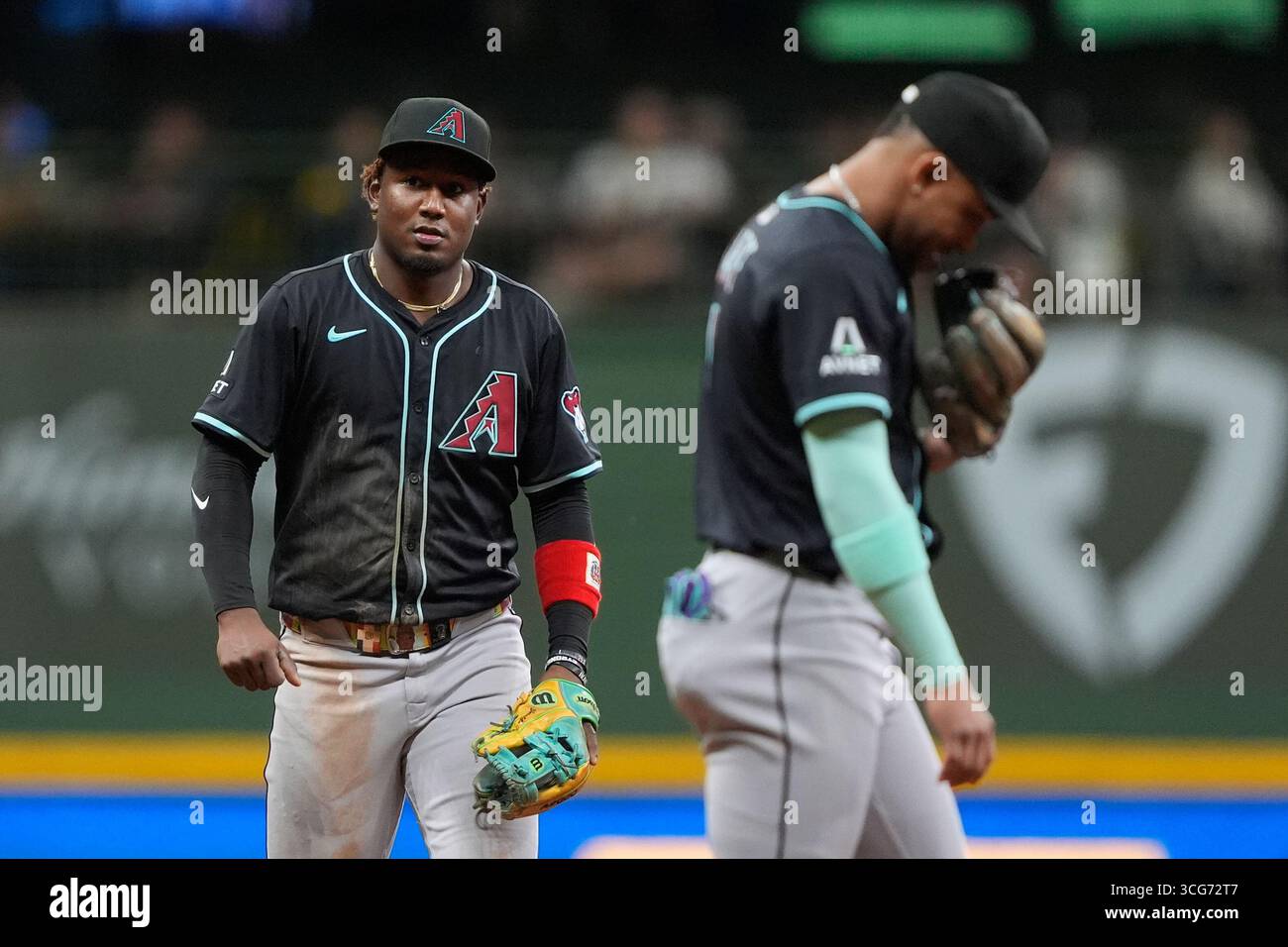 Arizona Diamondbacks' Geraldo Perdomo look on next to Ketel Marte ...