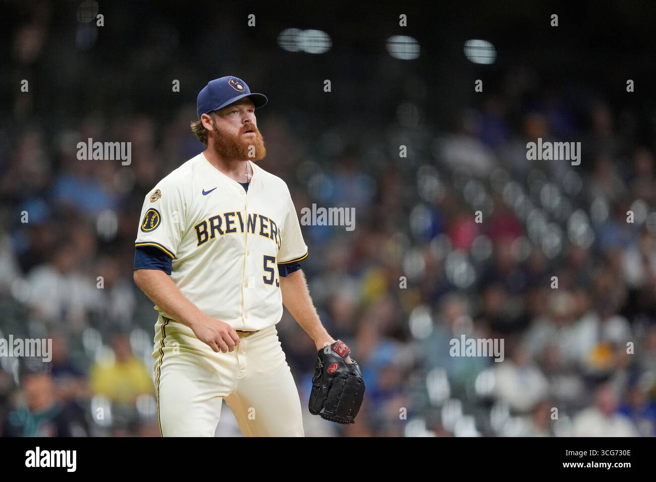 Milwaukee Brewers' Brandon Woodruff looks on during a baseball game ...