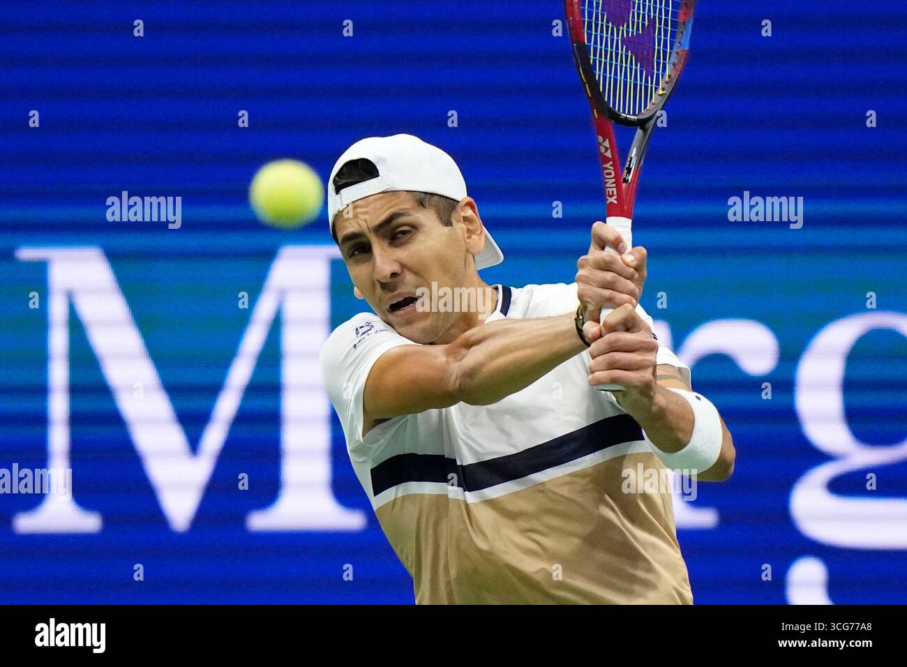 Alejandro Tabilo, of Chile, returns a shot against Alexander Zverev, of ...