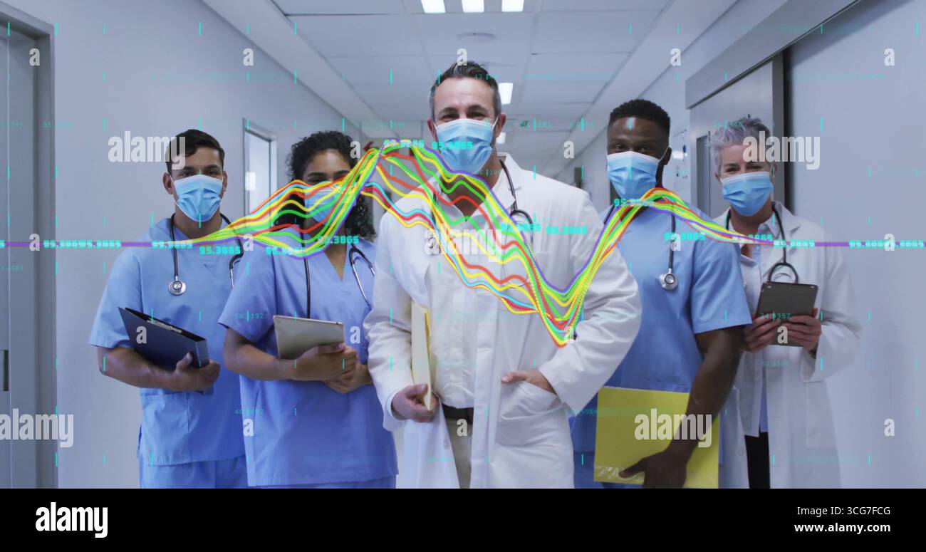 Reviewing tablet masked team hi-res stock photography and images - Alamy