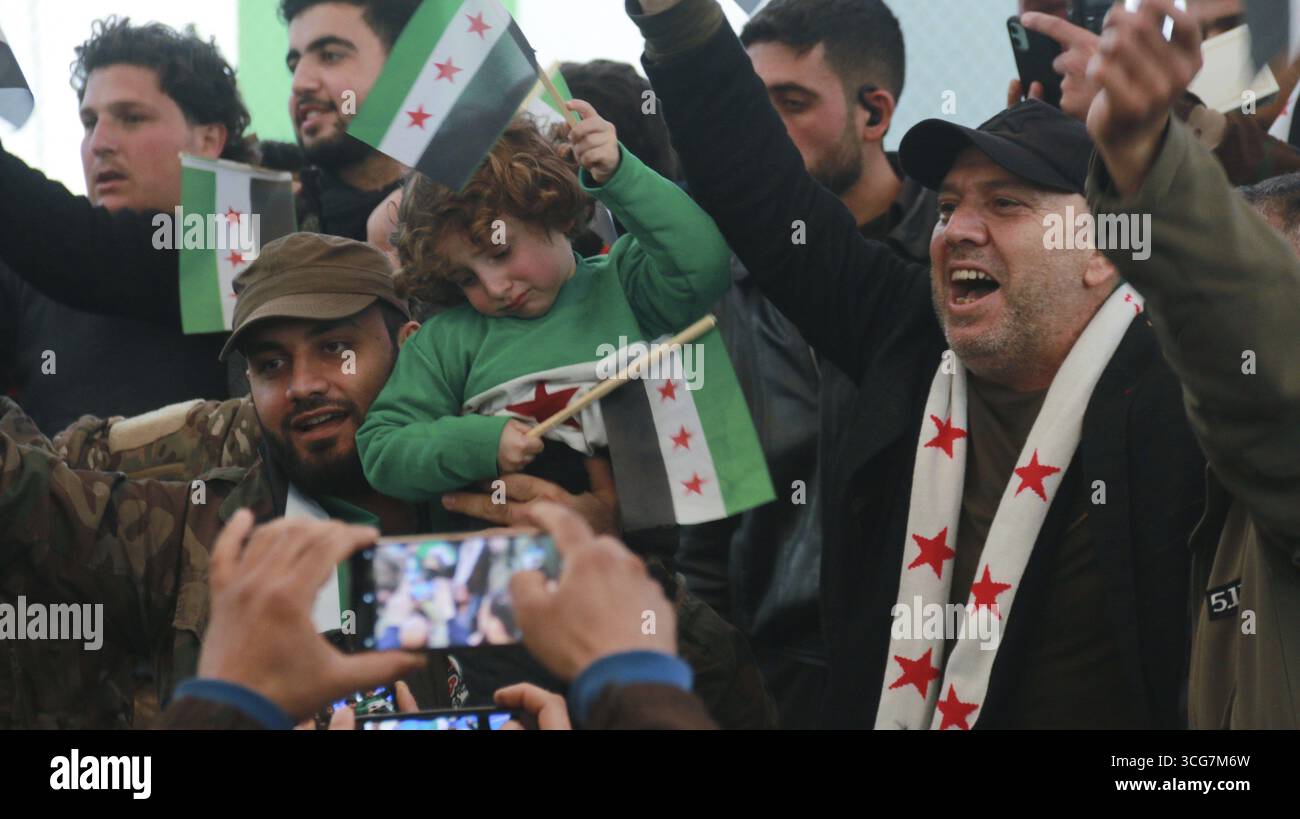 Syrians are seen demonstrating against the rule of Bashar al-Assad ...