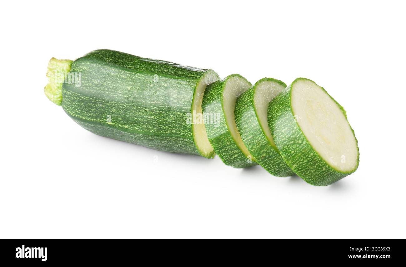 Pieces of fresh zucchini isolated on white Stock Photo - Alamy