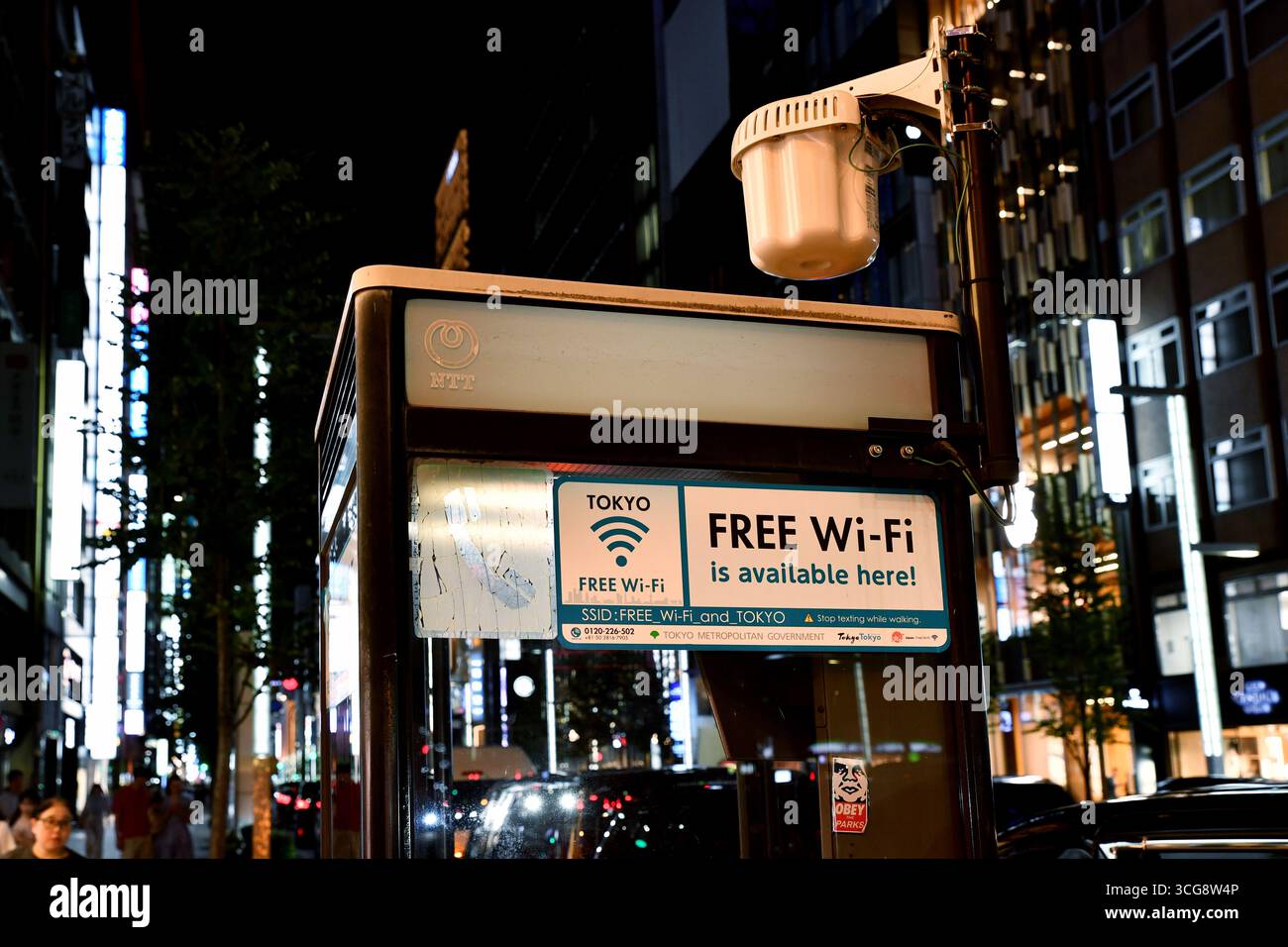 Free Wifi spot in street scene of Tokyo - Japan Stock Photo - Alamy