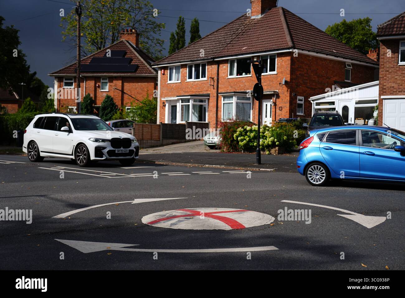 A roundabout painted as a St George's flag in Yardley Wood in south ...
