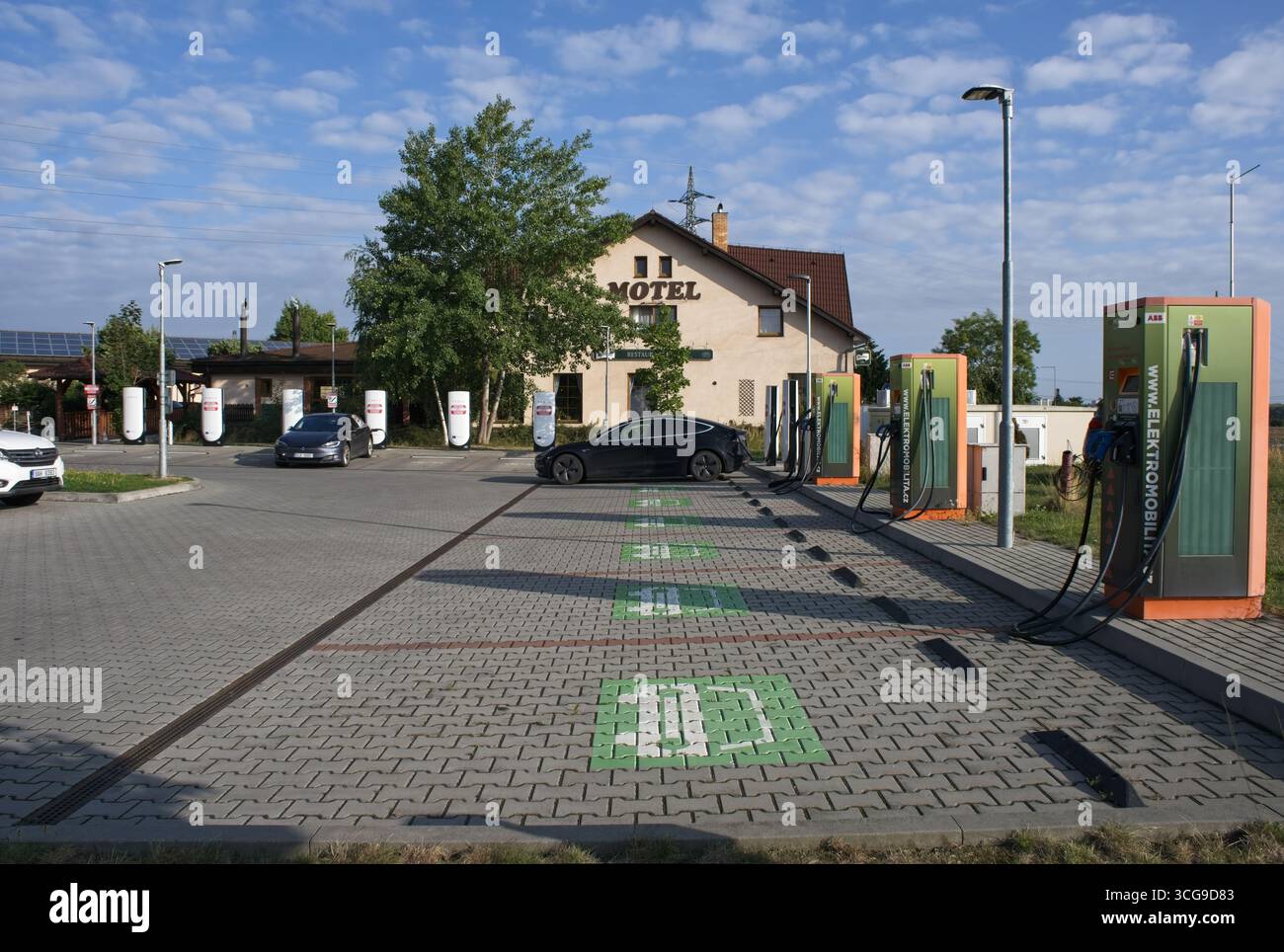 Prague, Czechia - Aug 17, 2025: A static shot of a solid black Tesla ...