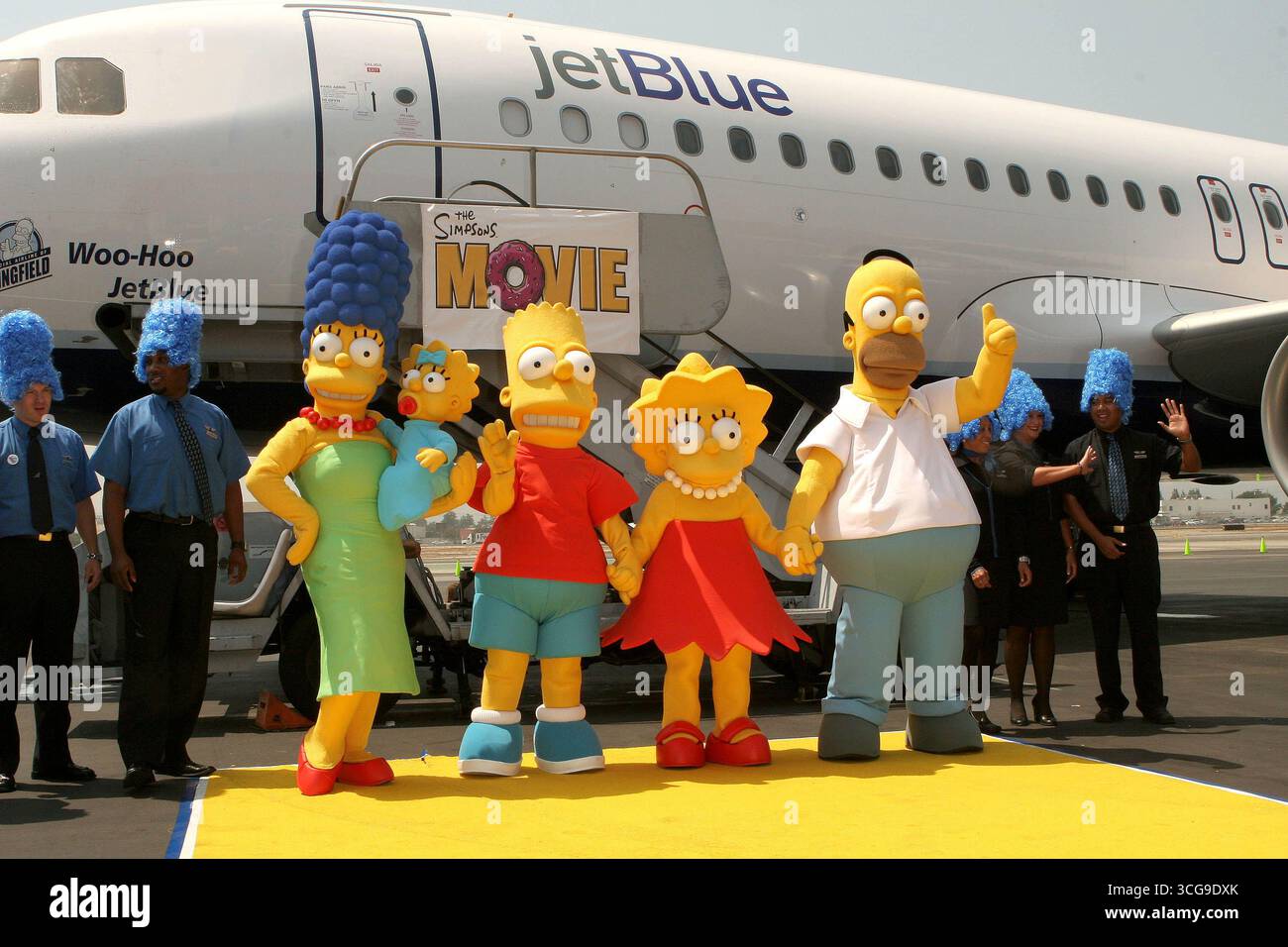Marge, Maggie, Bart, Lisa and Homer Simpson at the JetBlue Airways ...