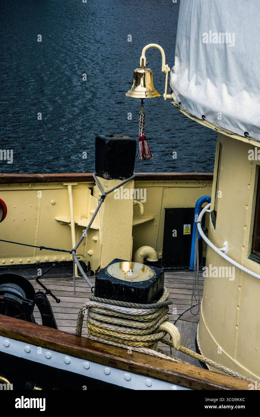 Ship's Bell on the steam tug "Daniel Adamson Stock Photo - Alamy