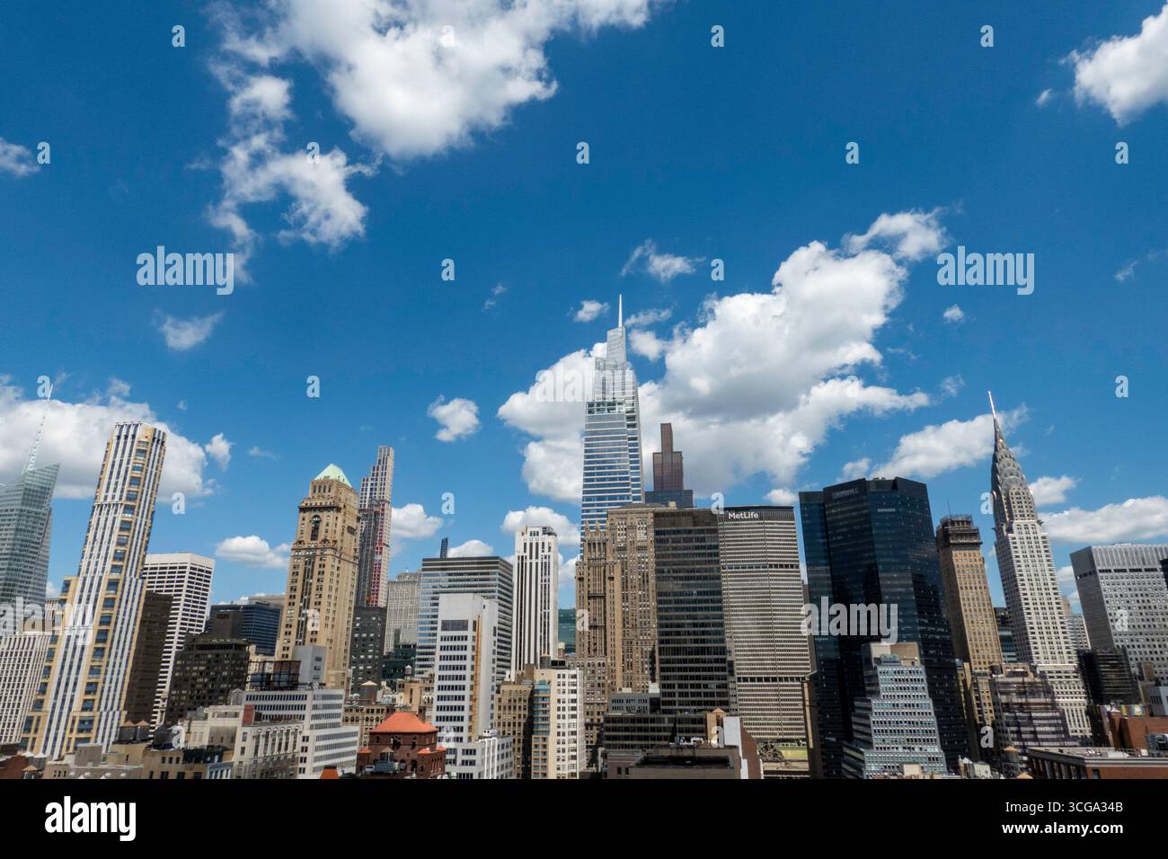View of Manhattan Midtown skyline from a luxury co-op apartment roof ...