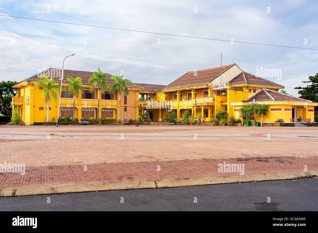 Yellow colonial-style building in Hoi An Ancient Town, Vietnam, serving ...