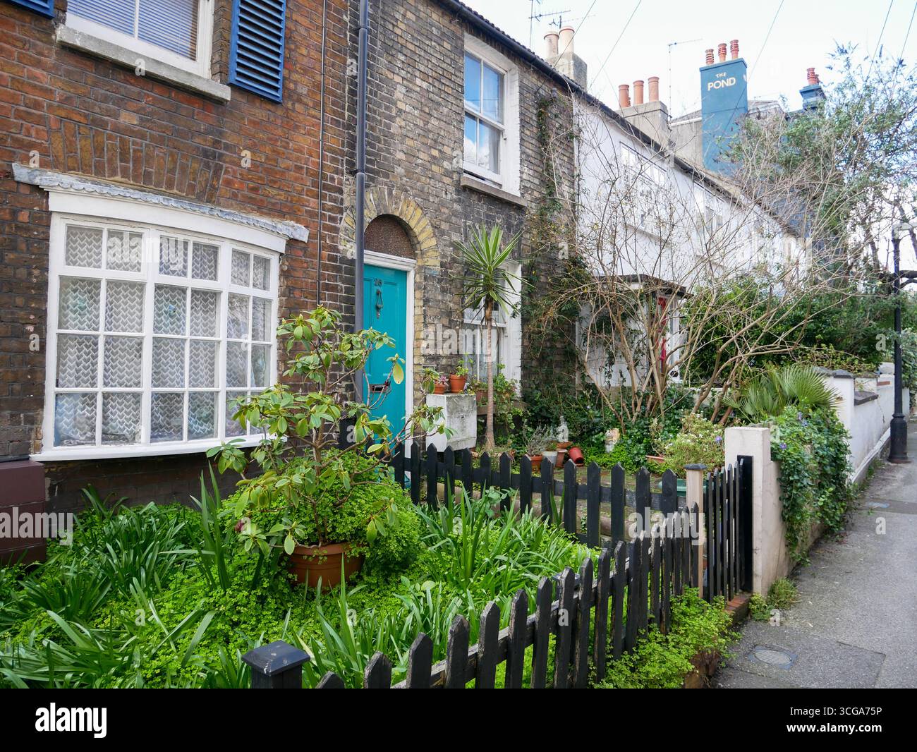 Two storey cottages in Frederick Gardens, Brighton, England were built ...