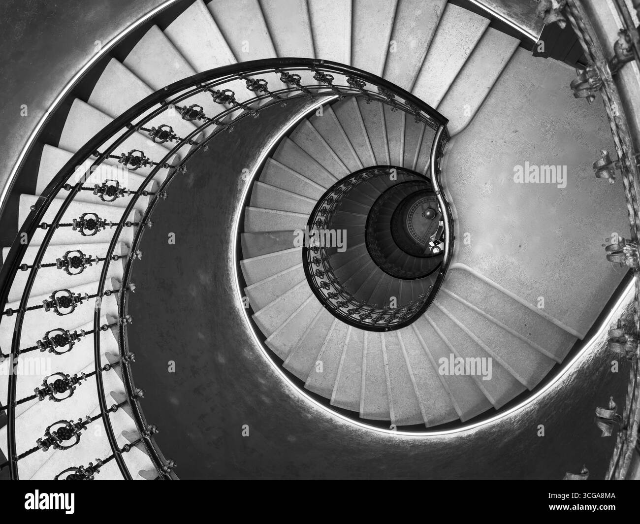 Elegant spiral staircase in a monochromatic tone viewed from above ...