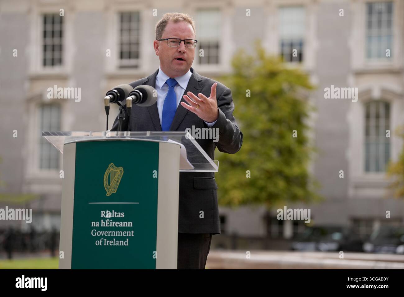 Further Education Minister James Lawless speaks to the media as he ...