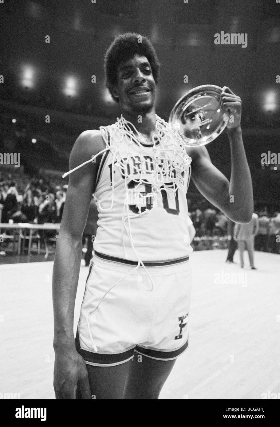 Darryl Brown, (30), of Fordham University, holds his award for most ...
