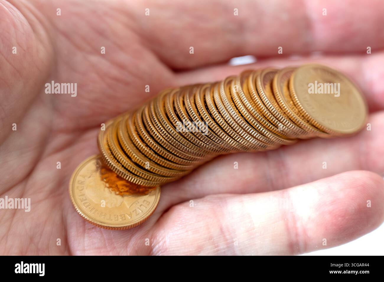 Gold sovereign quarter hi-res stock photography and images - Alamy