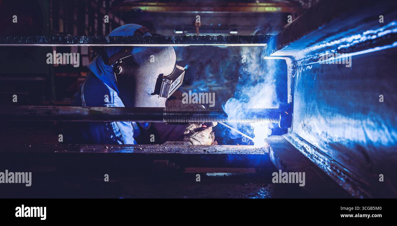 Welding steel structures and bright sparks in construction industry ...