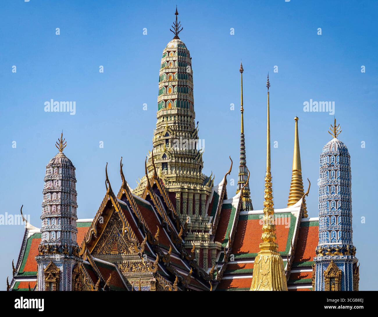 Ornate temple architecture with colorful spires and golden details ...