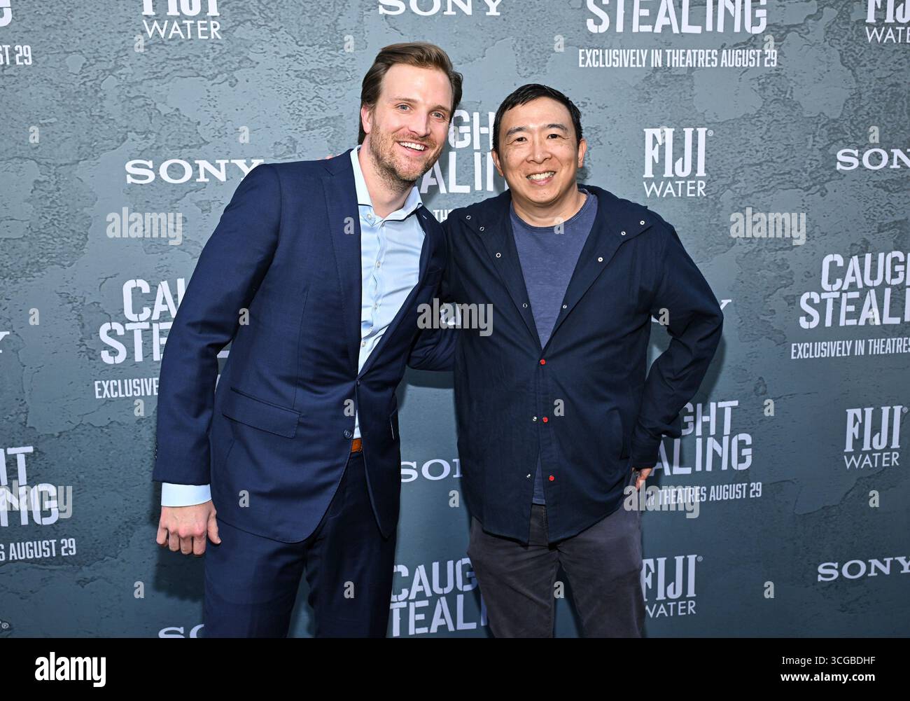 Zach Graumann, left, and Andrew Yang attend the premiere of "Caught ...