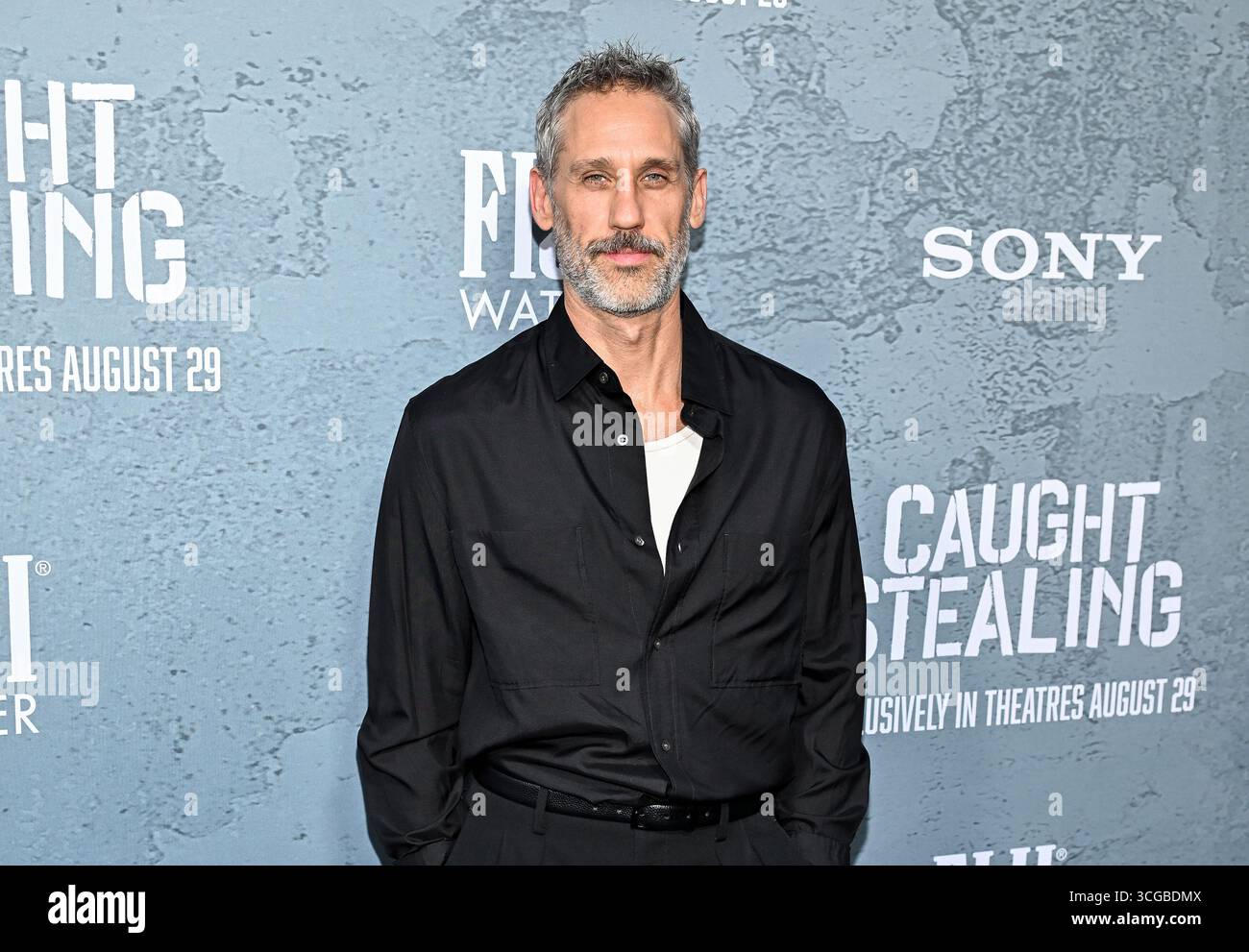 Rob Simonsen attends the premiere of "Caught Stealing" at Regal Union ...