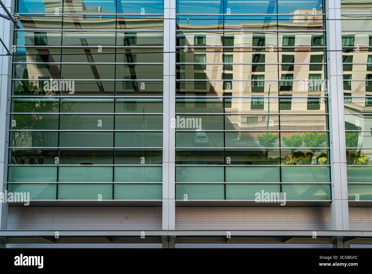 A strong reflection in windows at the Greater Tacoma Convention Center ...