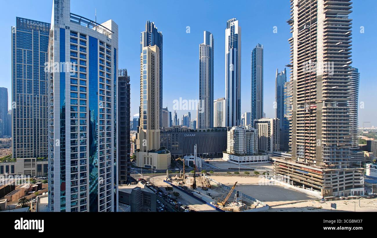 Iconic Dubai skyline and buildings during the day with futuristic ...