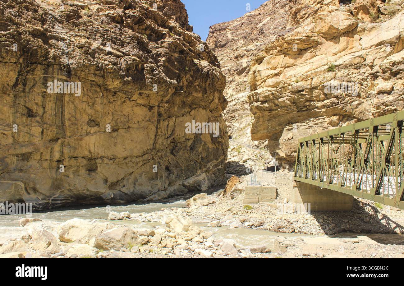 Narrow suspension bridges and rustic wooden crossings span rivers and ...