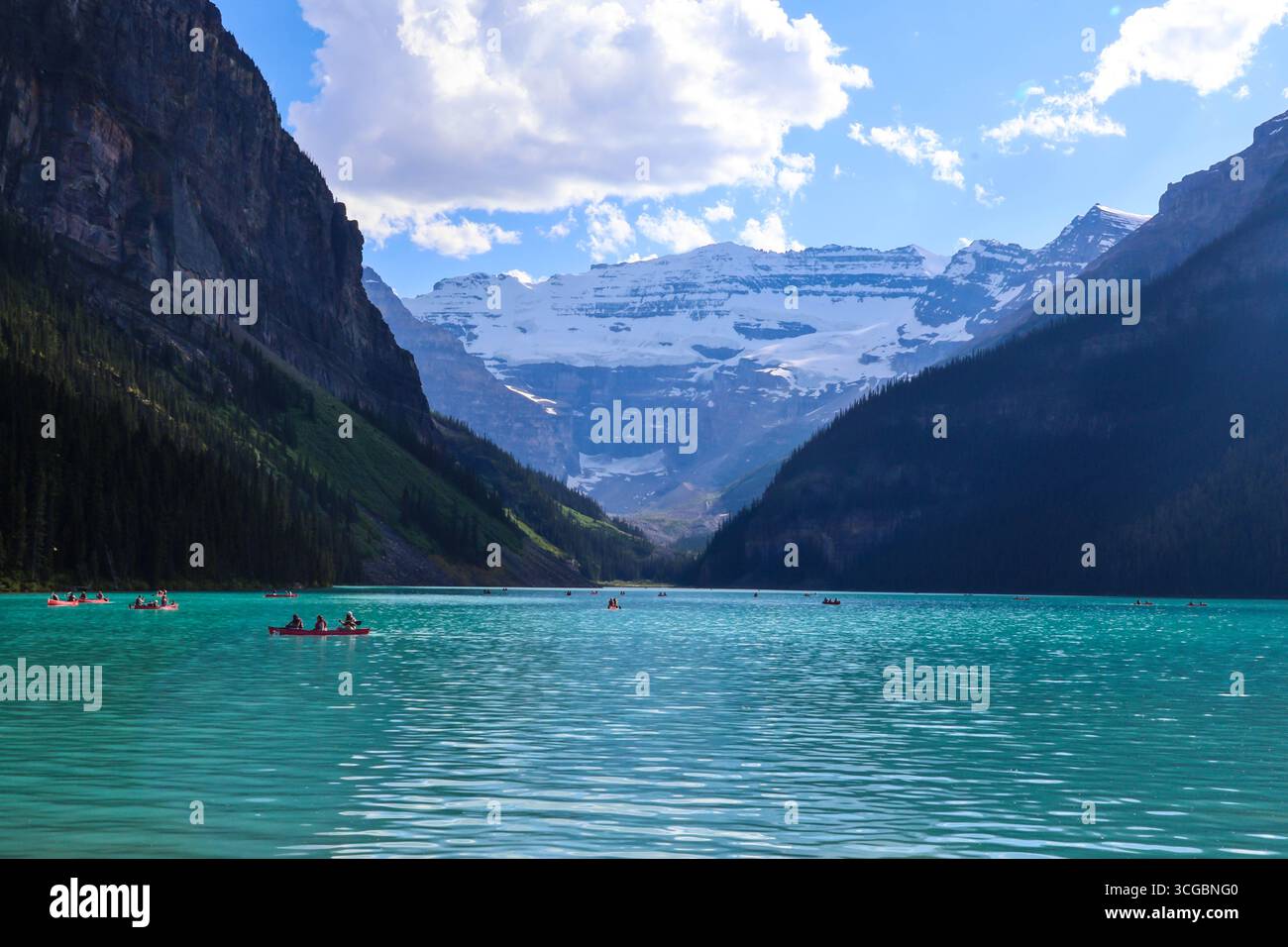 Iconic turquoise Lake Louise in Banff National Park, framed by the ...