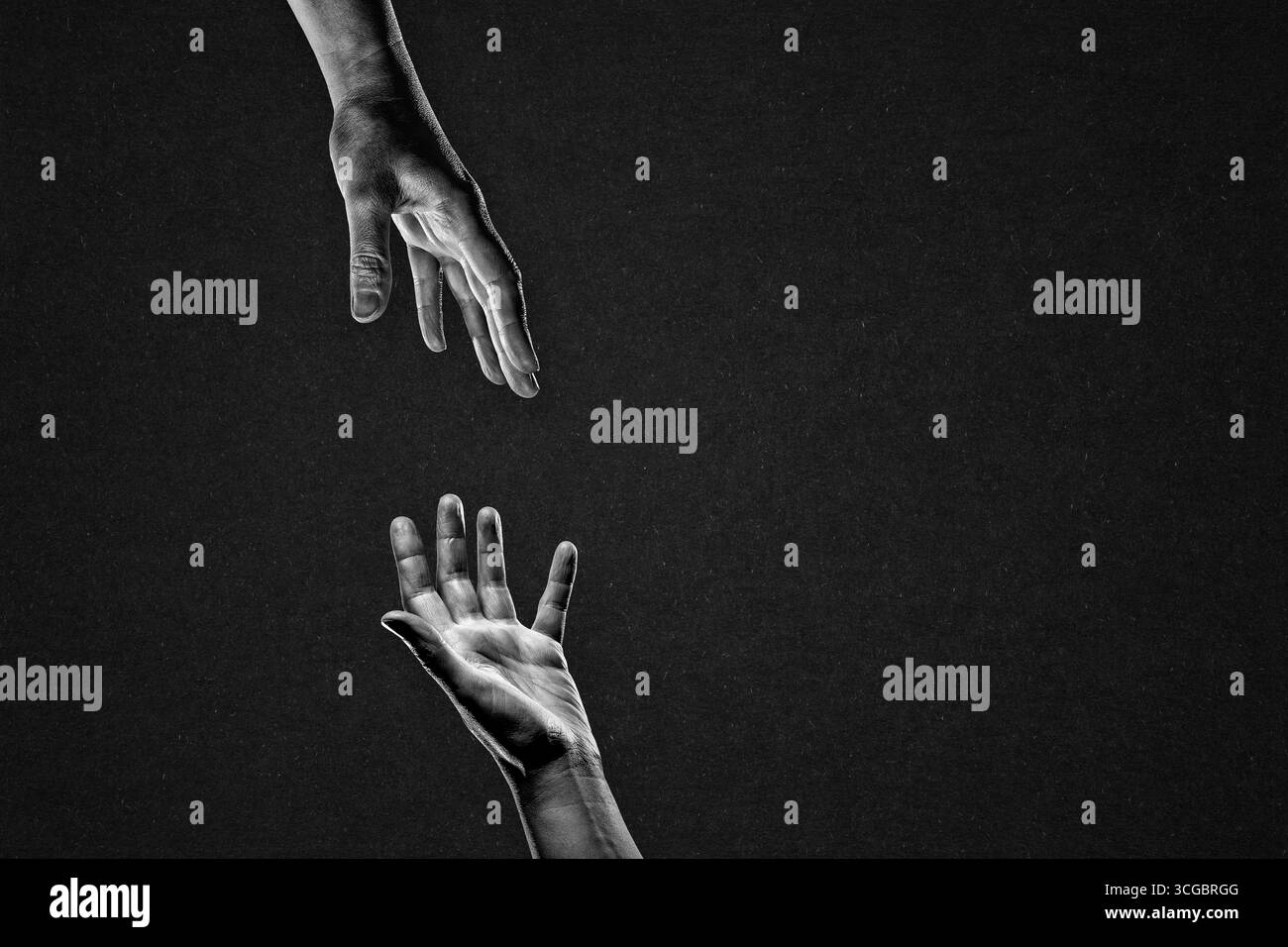 Helping hands with love Black and White Stock Photos & Images - Alamy