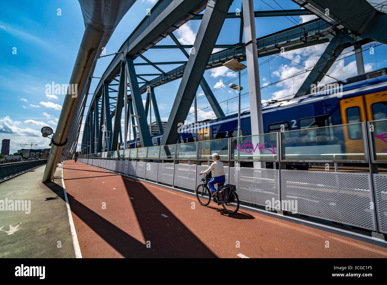 The Snelbinder Brug bicycle and pedestrian bridge over the Waal River ...