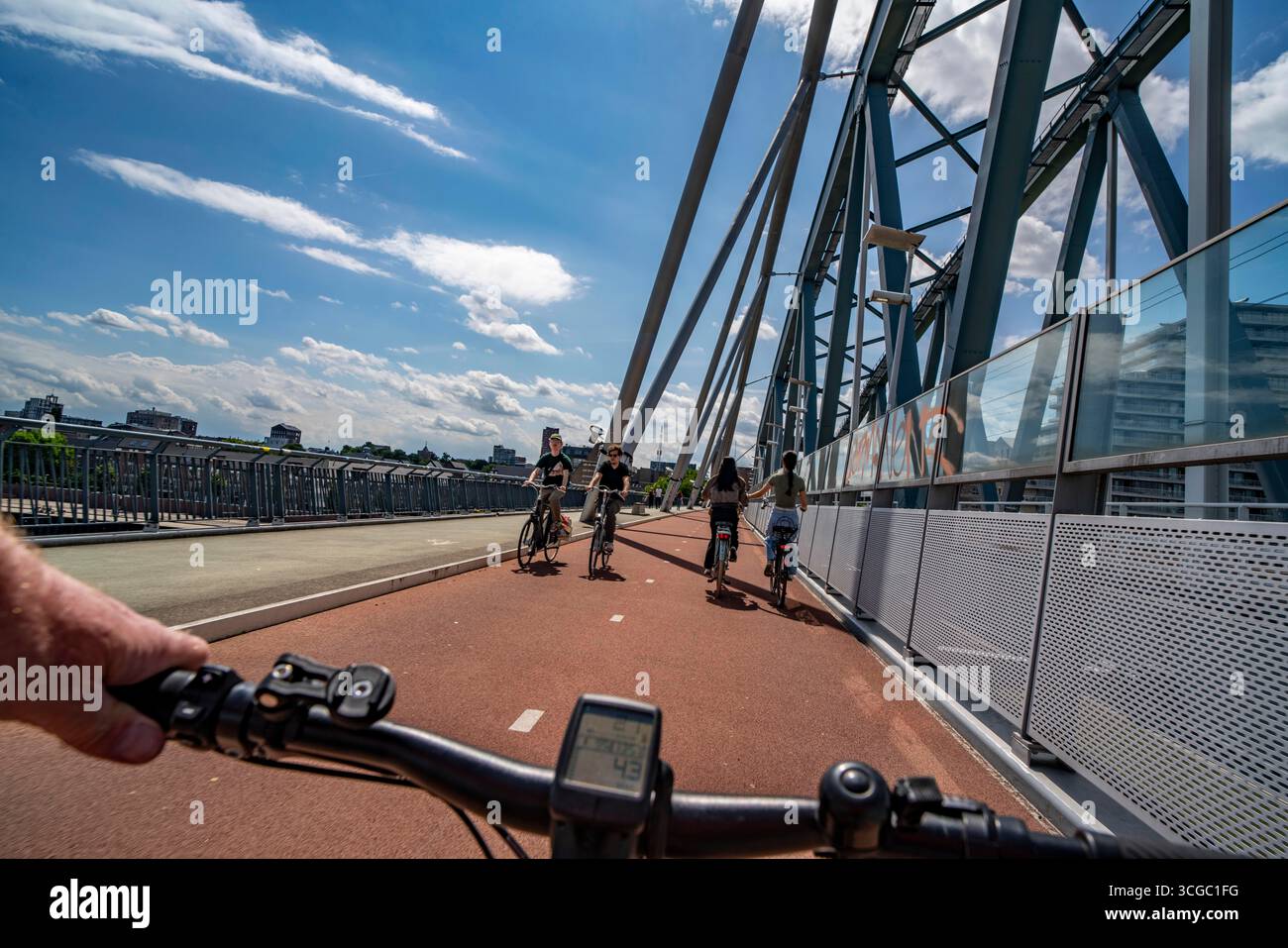 Crossing the Snelbinder Brug bicycle and pedestrian bridge over the ...