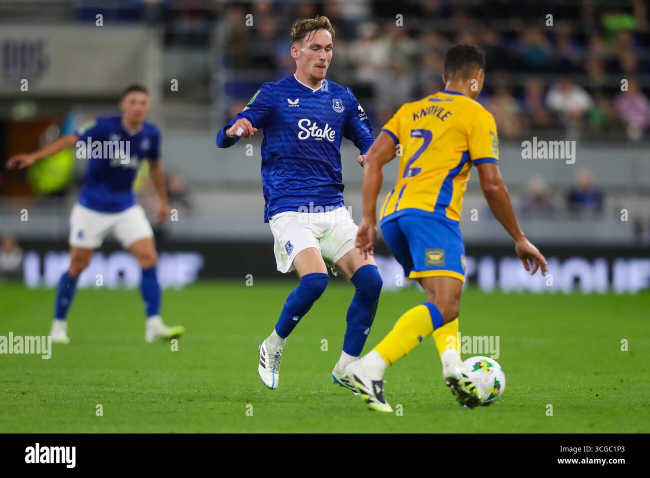 James Garner of Everton battles with Kyle Knoyle Of Mansfield Town ...