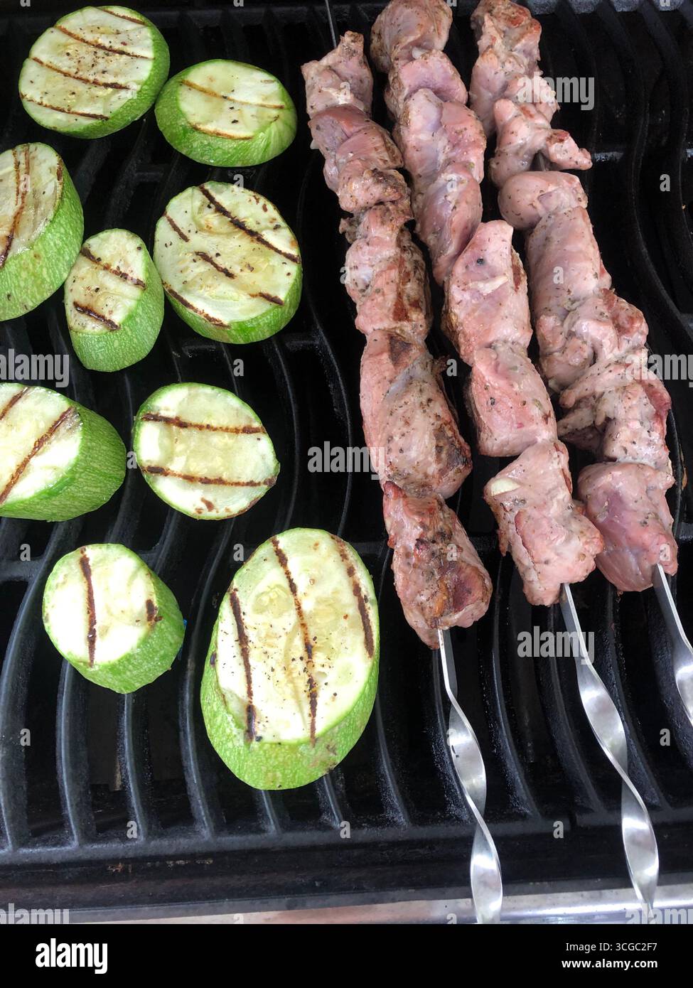 Juicy pork kebab and vegetable slices are grilled. We cook steak and ...