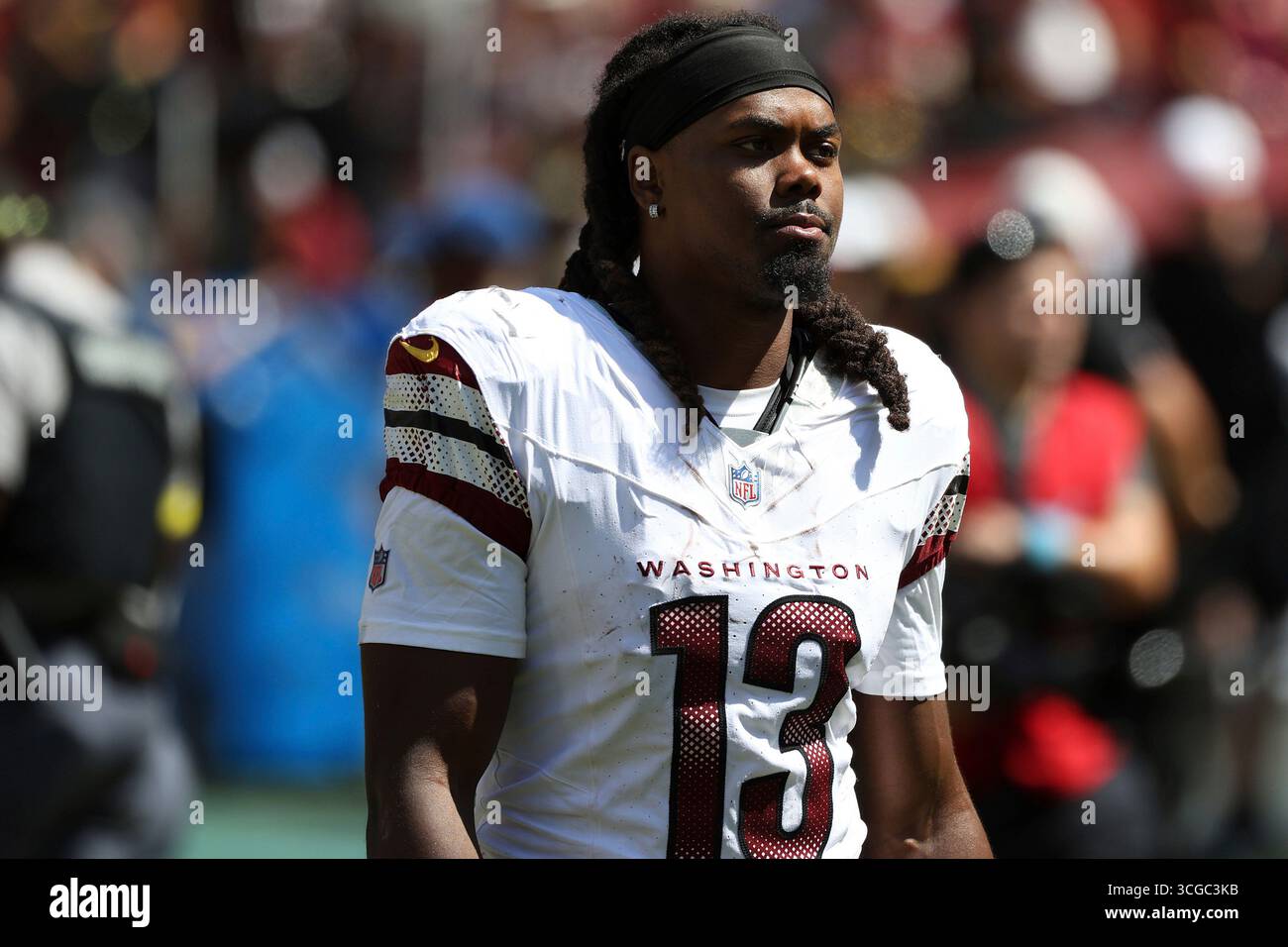 Washington Commanders wide receiver K.J. Osborn (13) looks on after an ...
