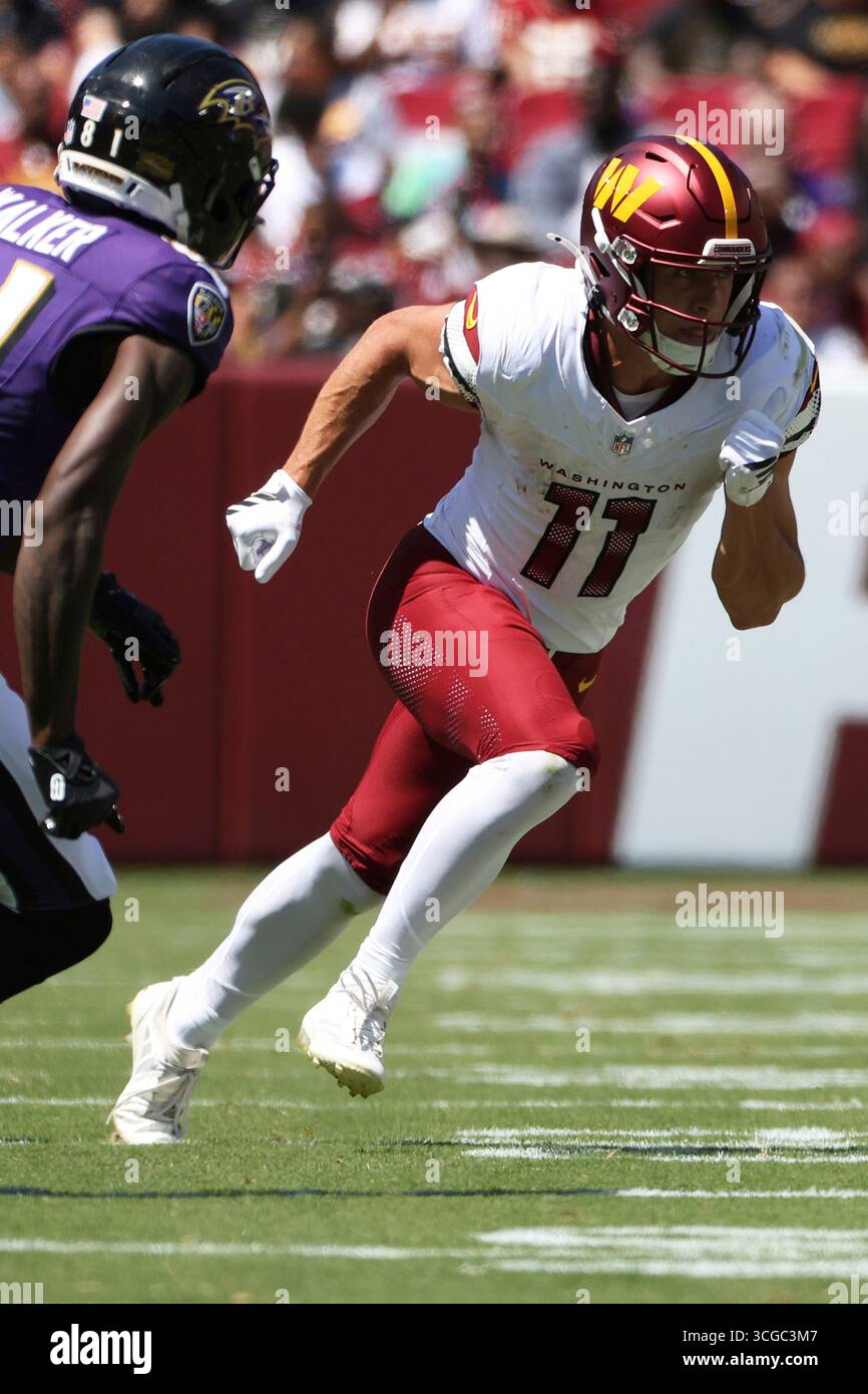 Washington Commanders wide receiver Luke McCaffrey (11) runs a route ...