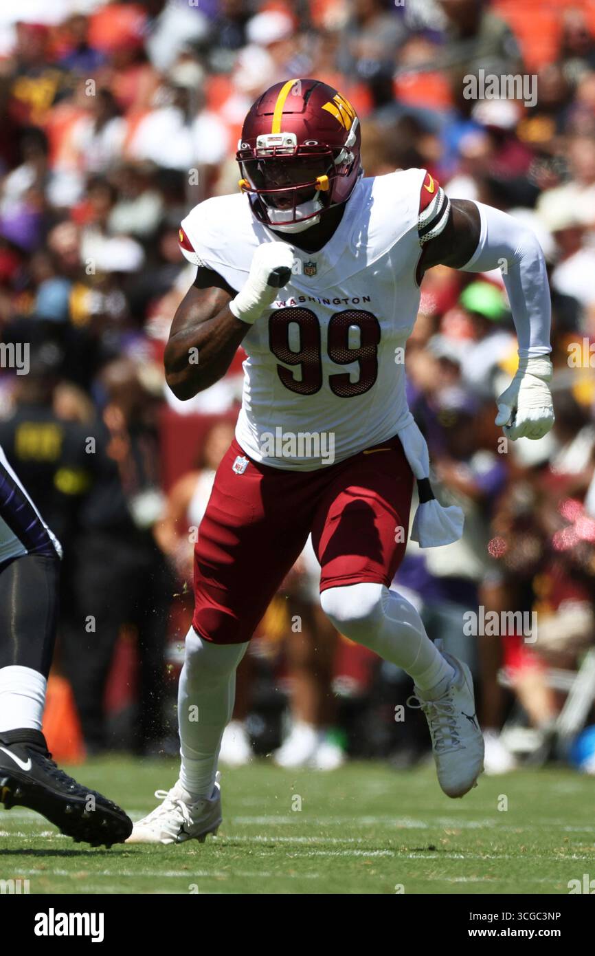 Washington Commanders defensive end Clelin Ferrell (99) rushes during ...