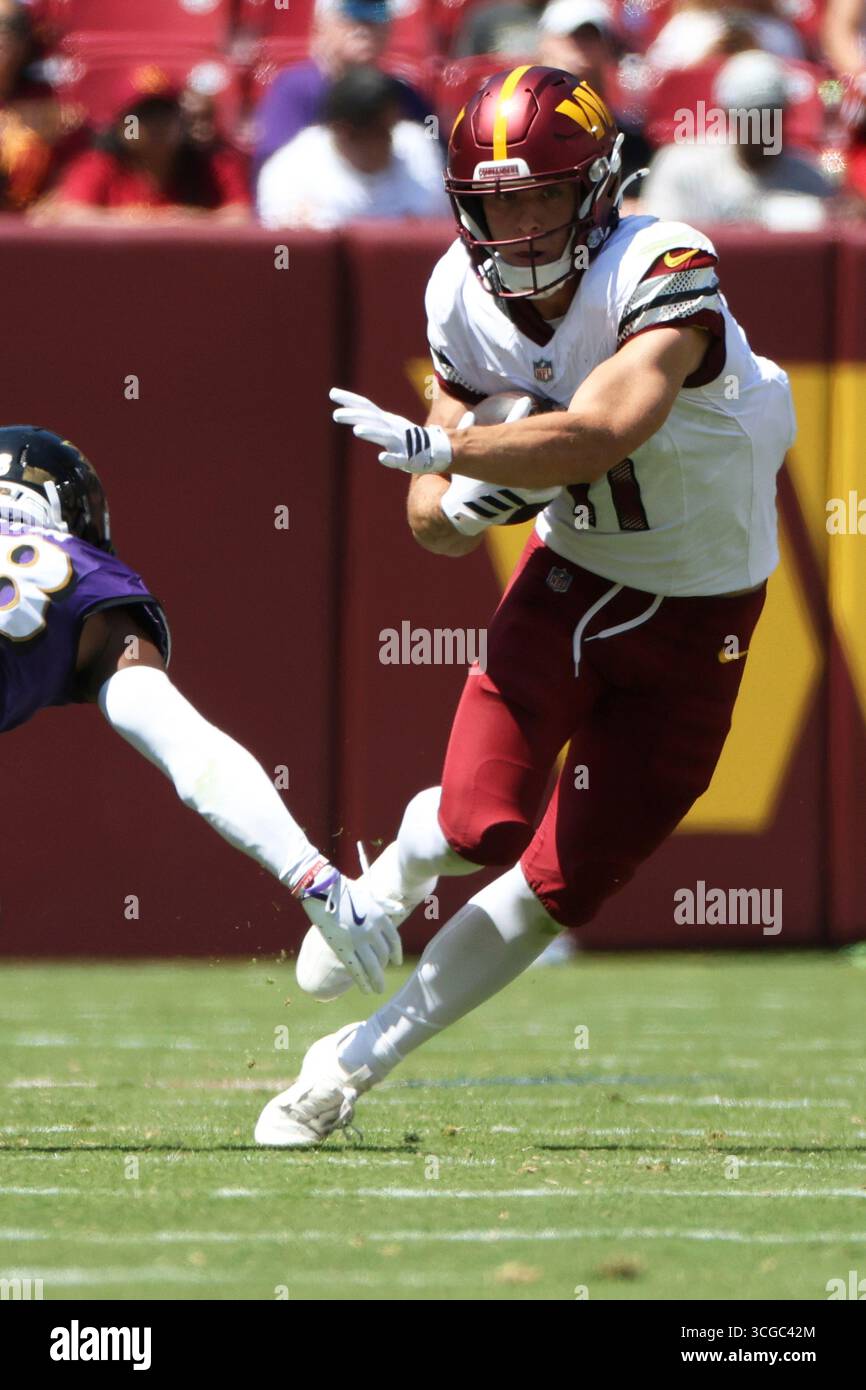 Washington Commanders wide receiver Luke McCaffrey (11) runs with the ...