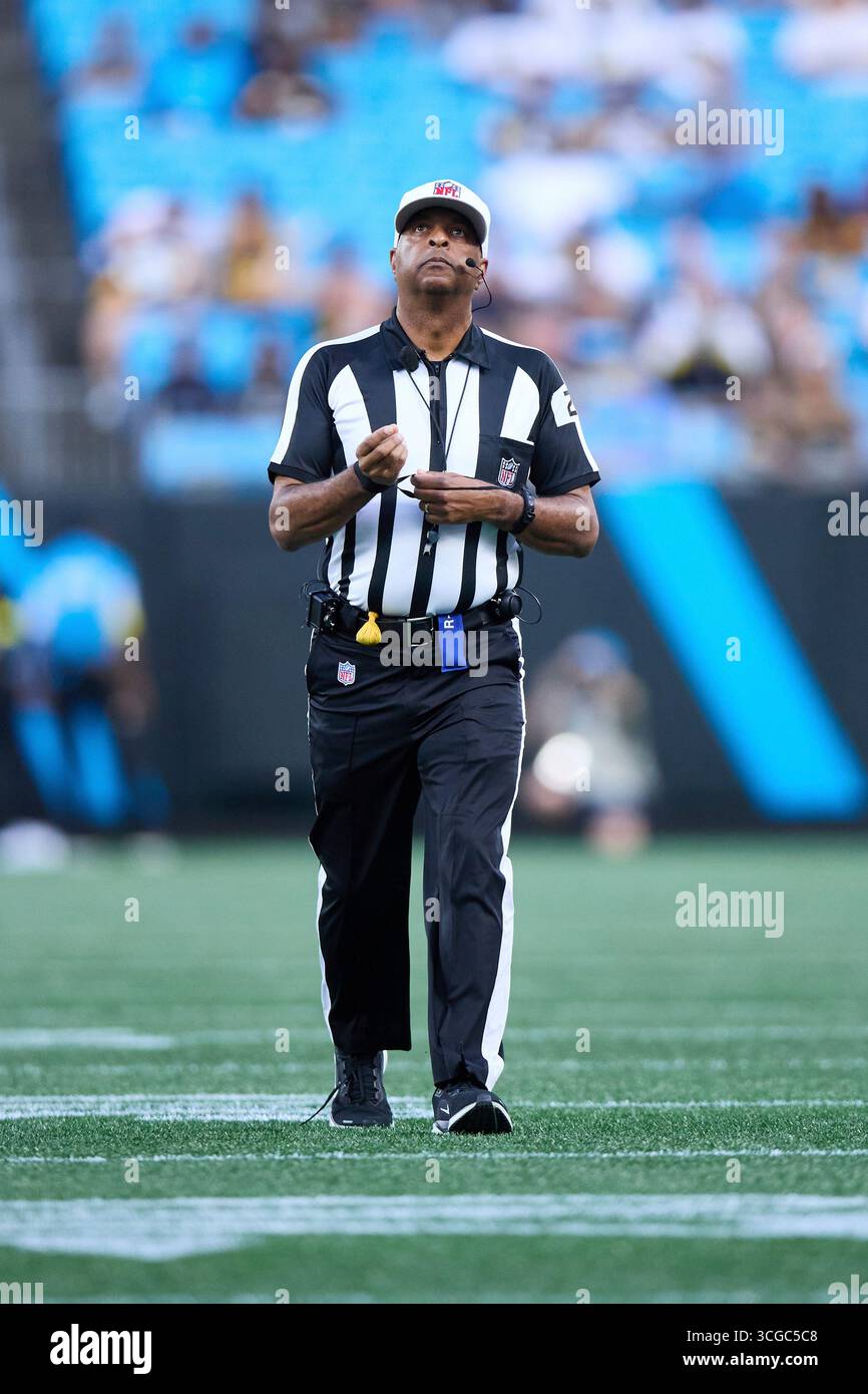 Referee Adrian Hill (29) walks down the field during an NFL preseason ...