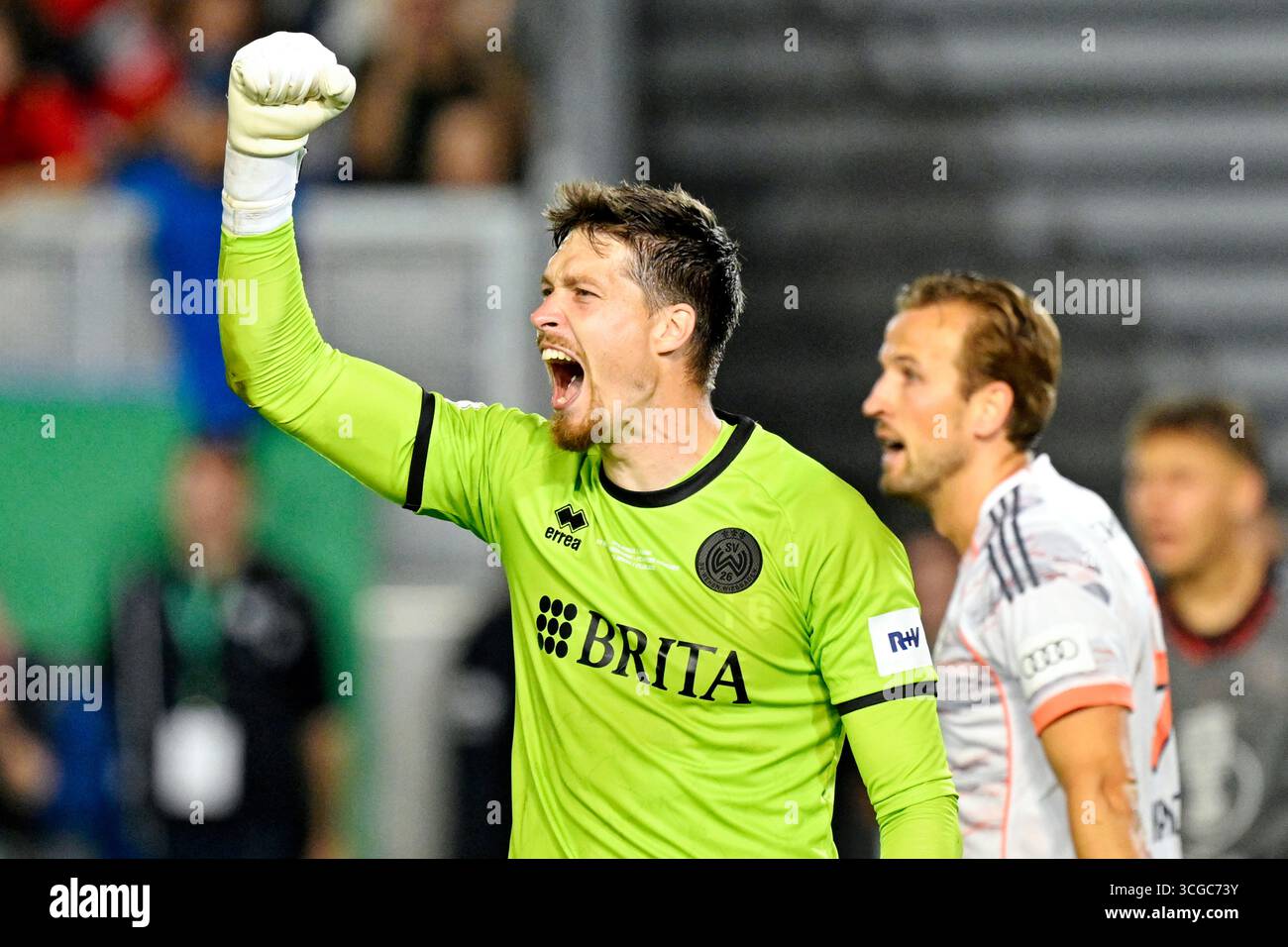 SV Wehen Wiesbaden goalkeeper Florian Stritzel celebrates after saving ...