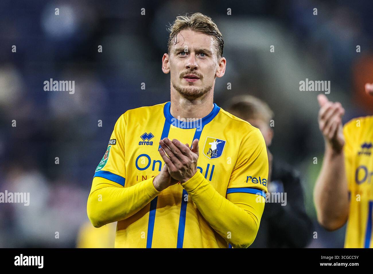 Liverpool, UK. 27th Aug, 2025. Elliott Hewitt of Mansfield Town ...