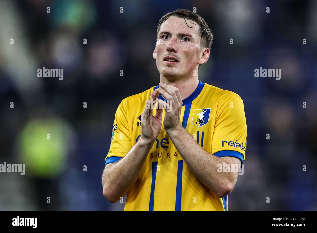 Regan Hendry of Mansfield Town applauds the fans after the game during ...