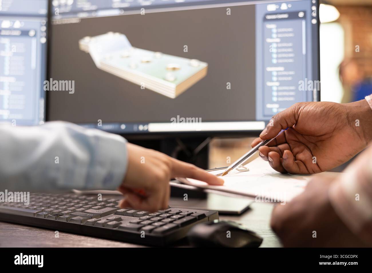 Reviewing software developers collaborating hi-res stock photography ...
