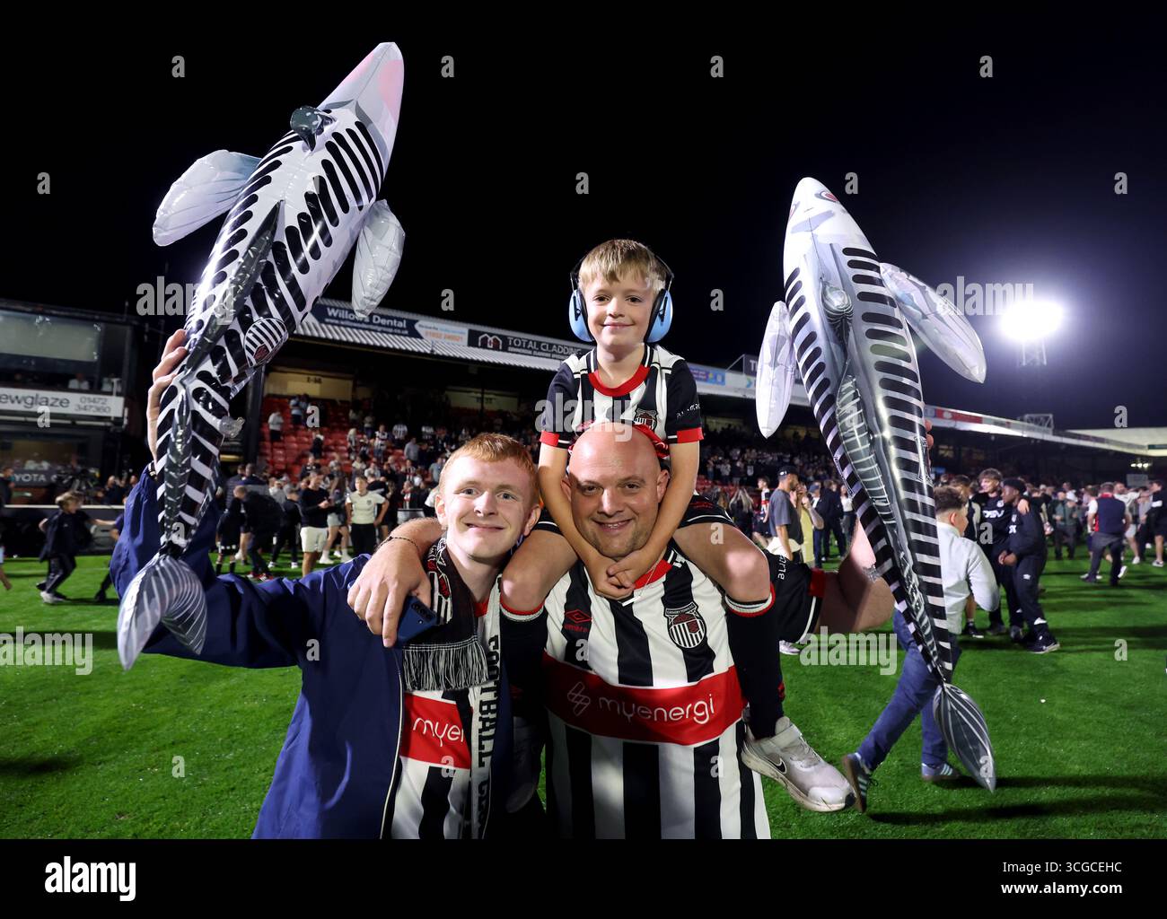 Grimsby Town’s fans celebrate their victory after their penalty shoot ...