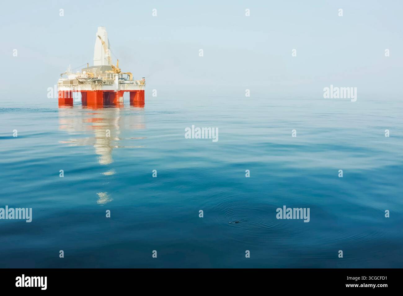 An offshore oil and gas drilling platform in the middle of the Arctic ...