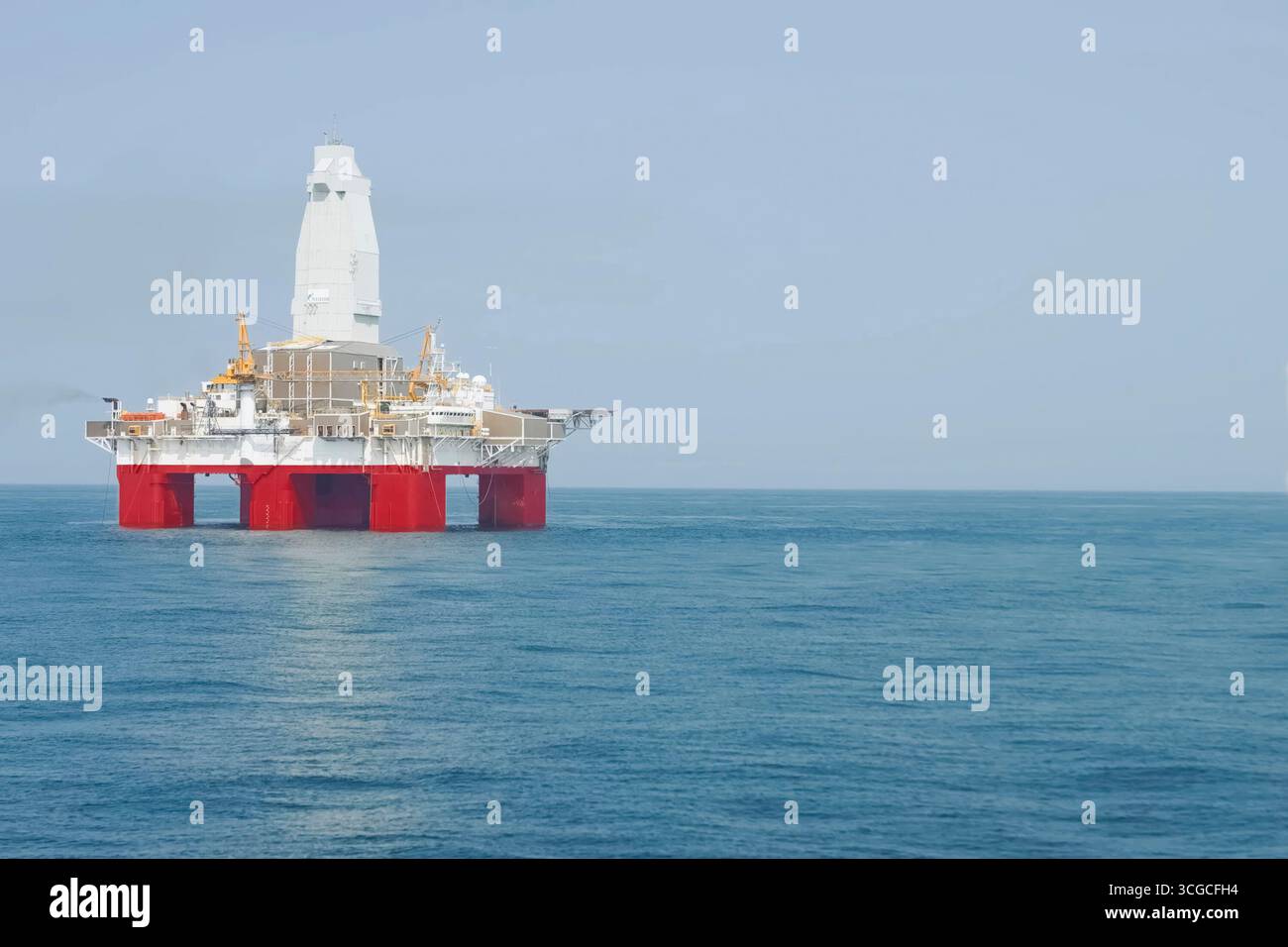An offshore oil and gas drilling platform in the middle of the Arctic ...
