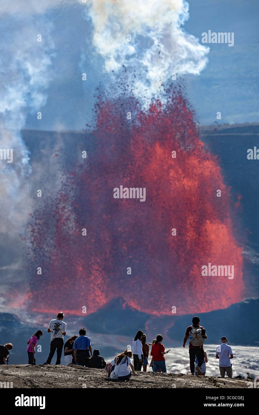 crowds gather to watch lava fountains erupting in the caldera of ...