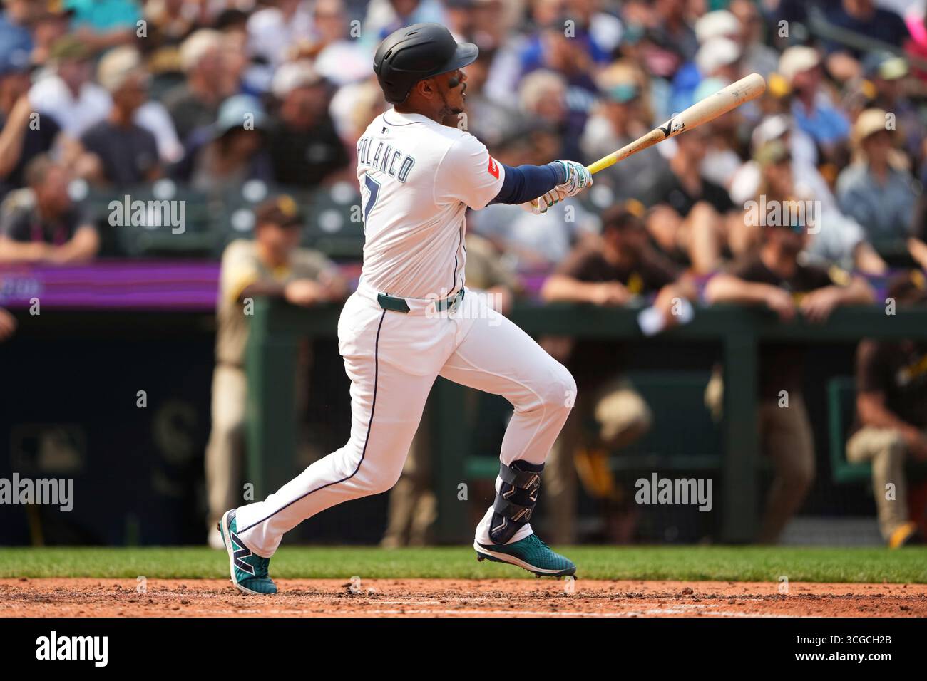 Seattle Mariners designated hitter Jorge Polanco hits a double during ...