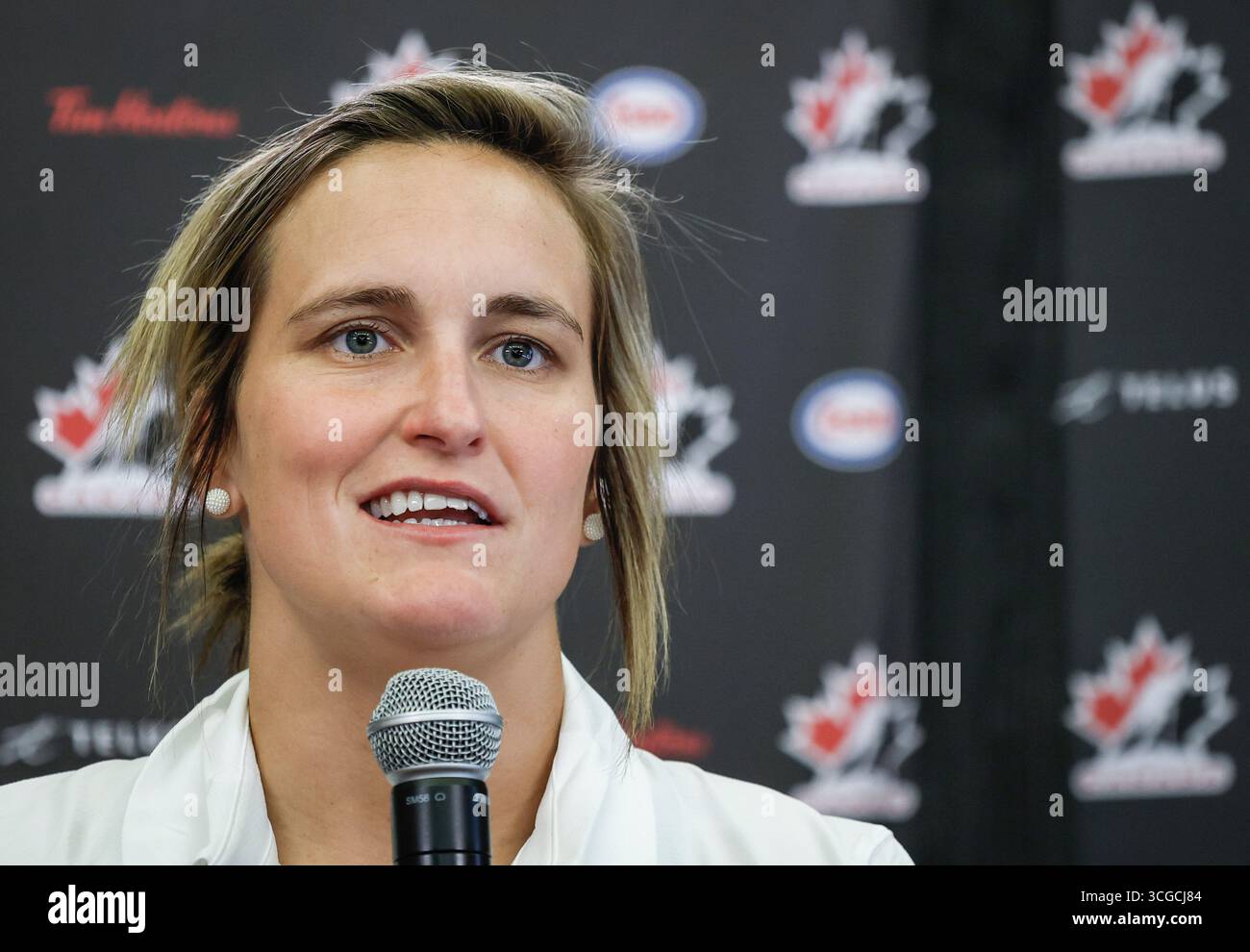 Team Canada women's hockey player Marie-Philip Poulin speaks to the ...